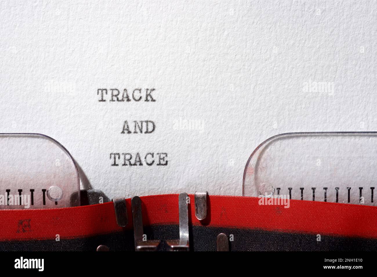 Track and trace text written with a typewriter Stock Photo - Alamy