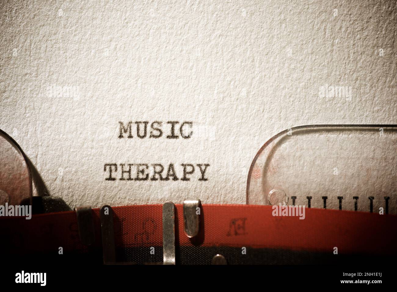 Music therapy text written with a typewriter Stock Photo - Alamy