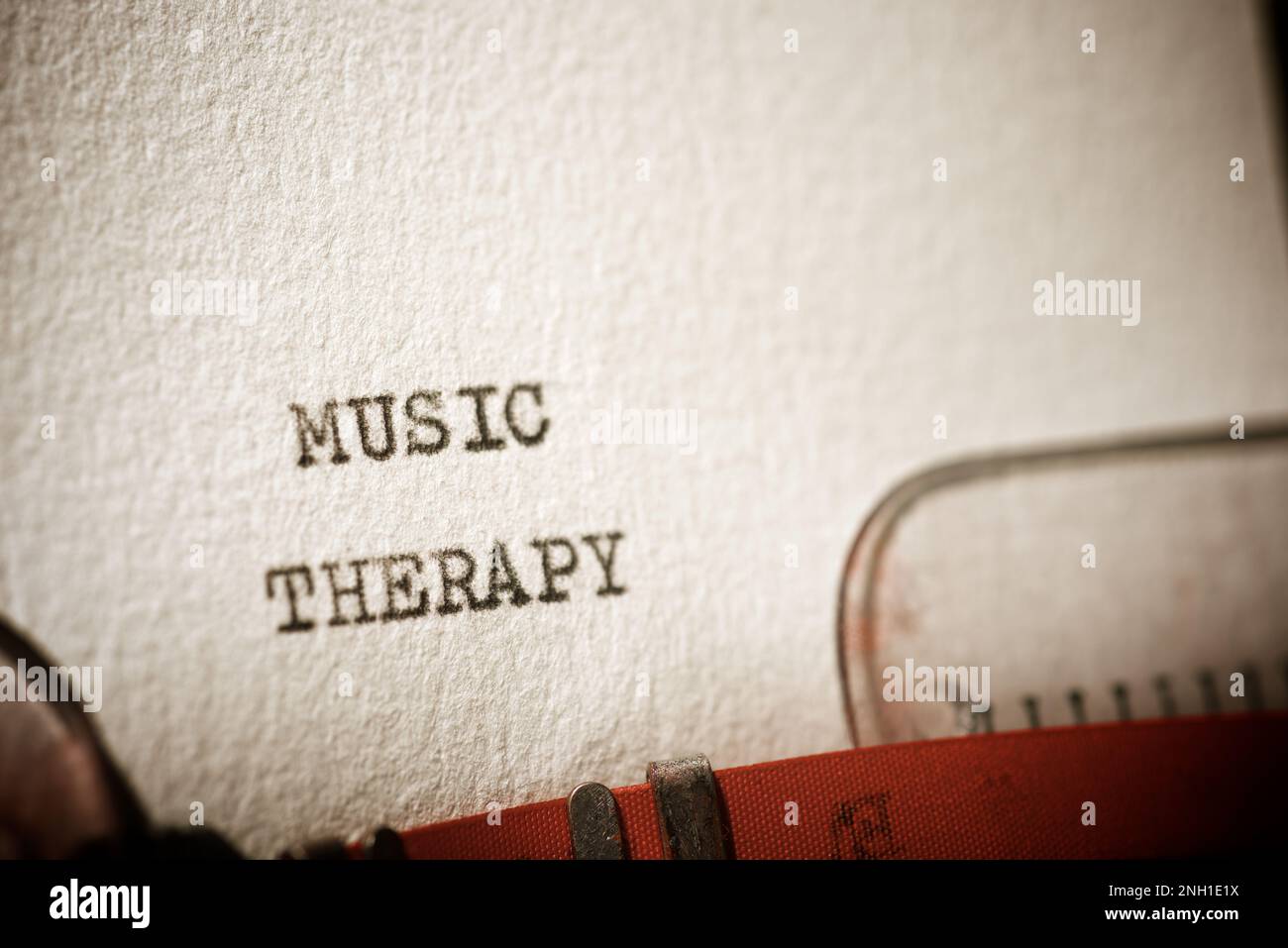 Music therapy text written with a typewriter Stock Photo - Alamy