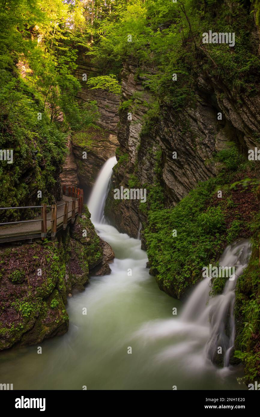 A built hiking trail leading to a waterfall Stock Photo - Alamy