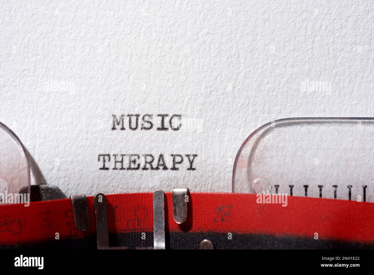 Music therapy text written with a typewriter Stock Photo - Alamy