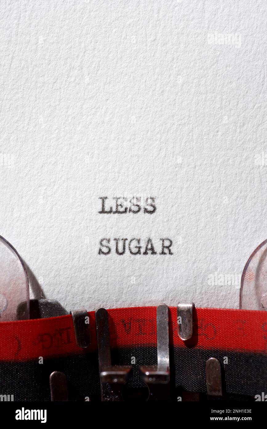 Less sugar text written with a typewriter Stock Photo - Alamy