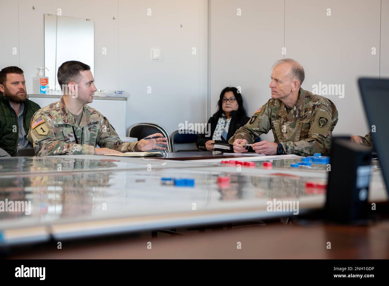 U.S. Army Maj. Christopher Bartok, I Corps G6 operations chief, briefs ...
