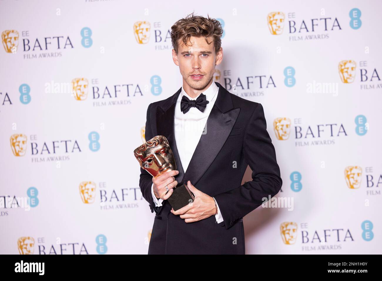 Austin Butler, winner of the leading actor award for 'Elvis', poses for ...