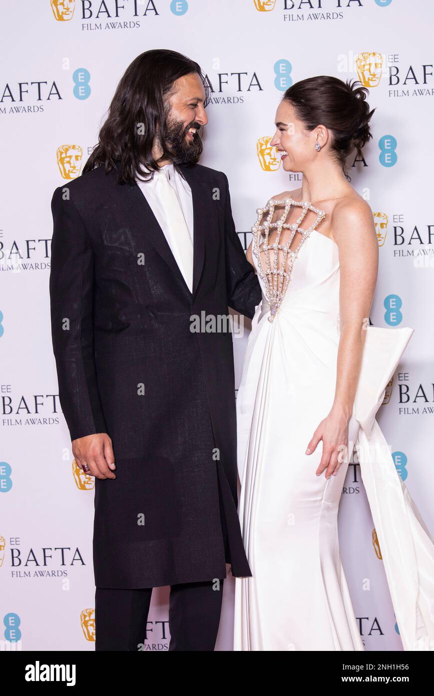 Shazad Latif, left, and Lily James pose for photographers at the 76th ...