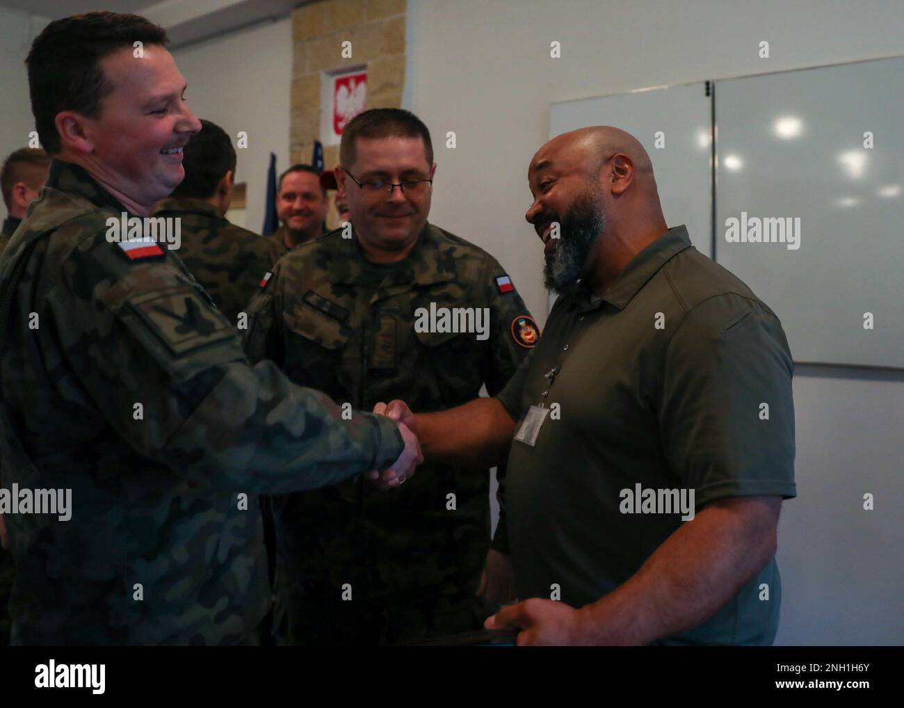 Polish soldiers thank their Abrams New Equipment Training instructor ...