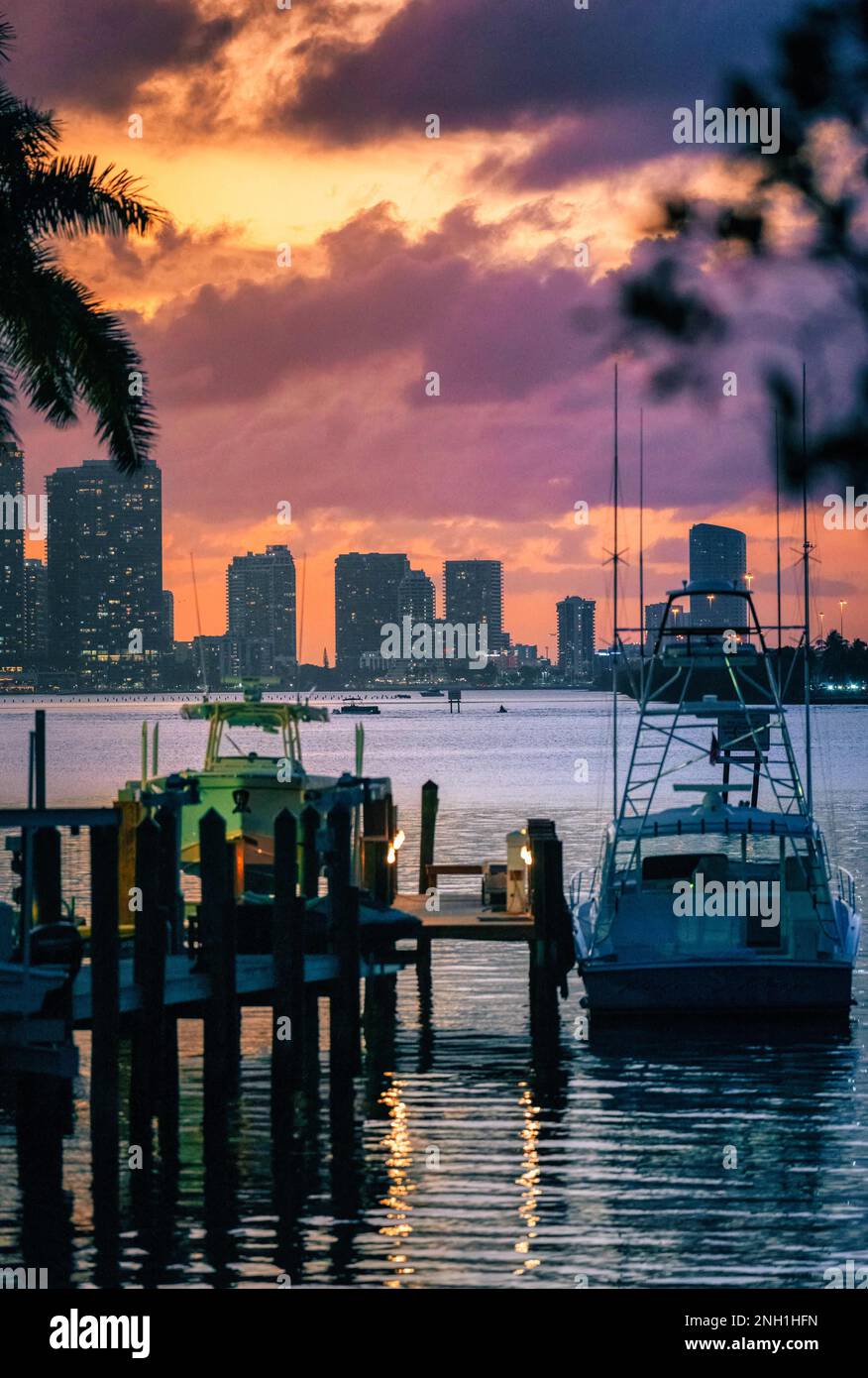 city skyline at sunset marina boats sky clouds Miami Beach Stock Photo ...