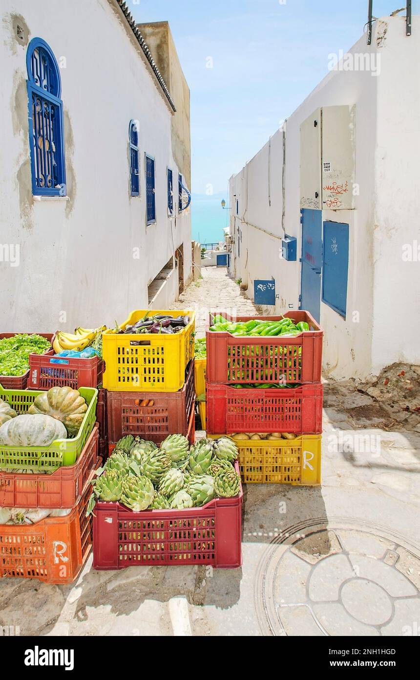 Fruits and vegetables with sea in the background Stock Photo - Alamy