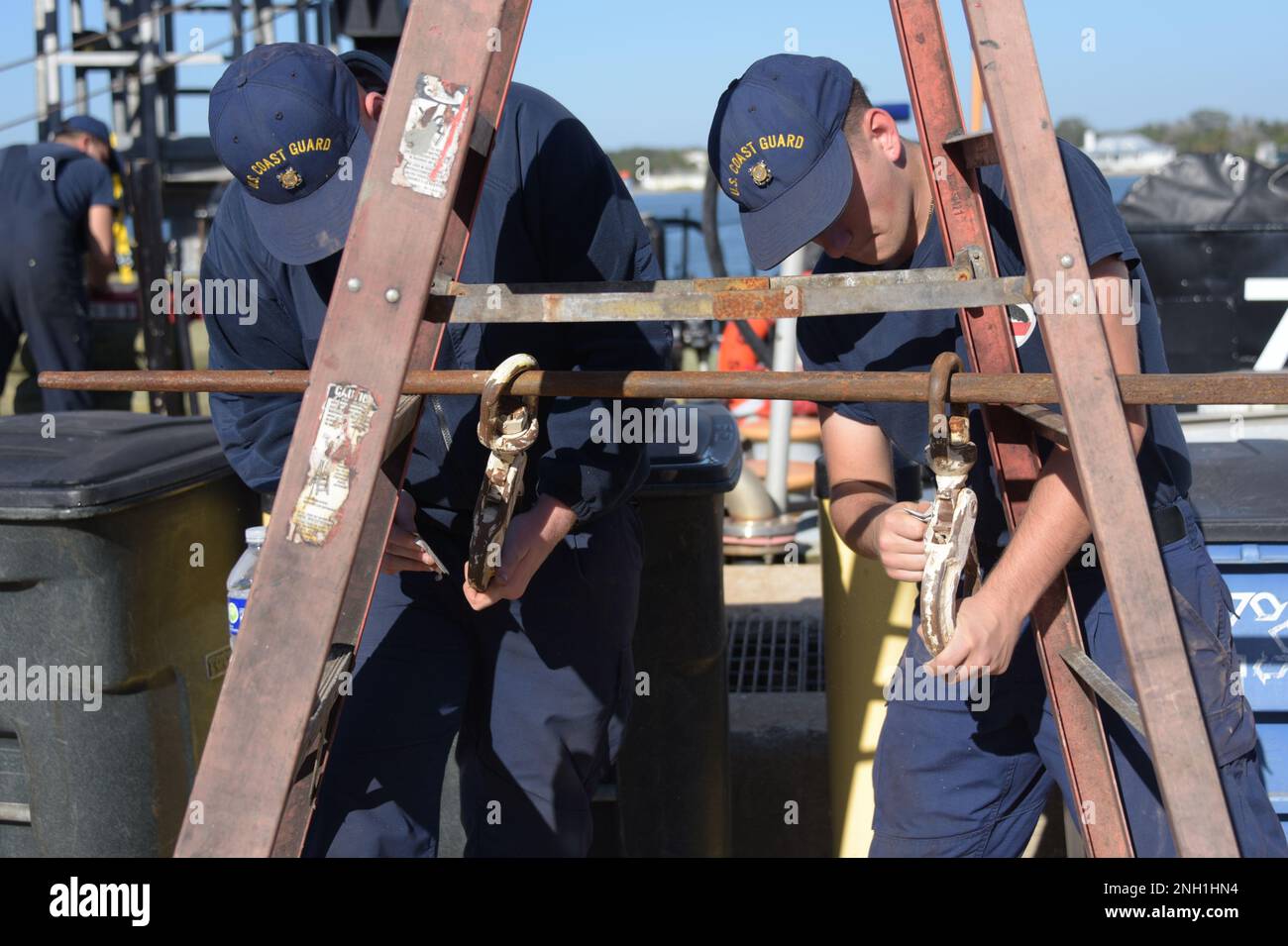 U.S. Coast Guardsmen working aboard the USCGC Maria Bray (WLIC-75302 ...