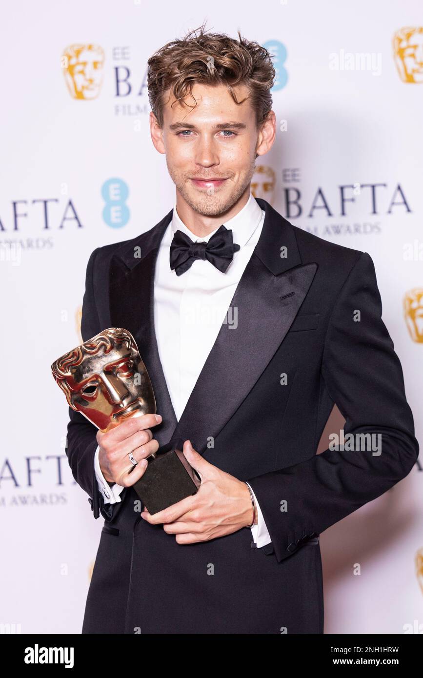 Austin Butler, winner of the leading actor award for 'Elvis', poses for ...