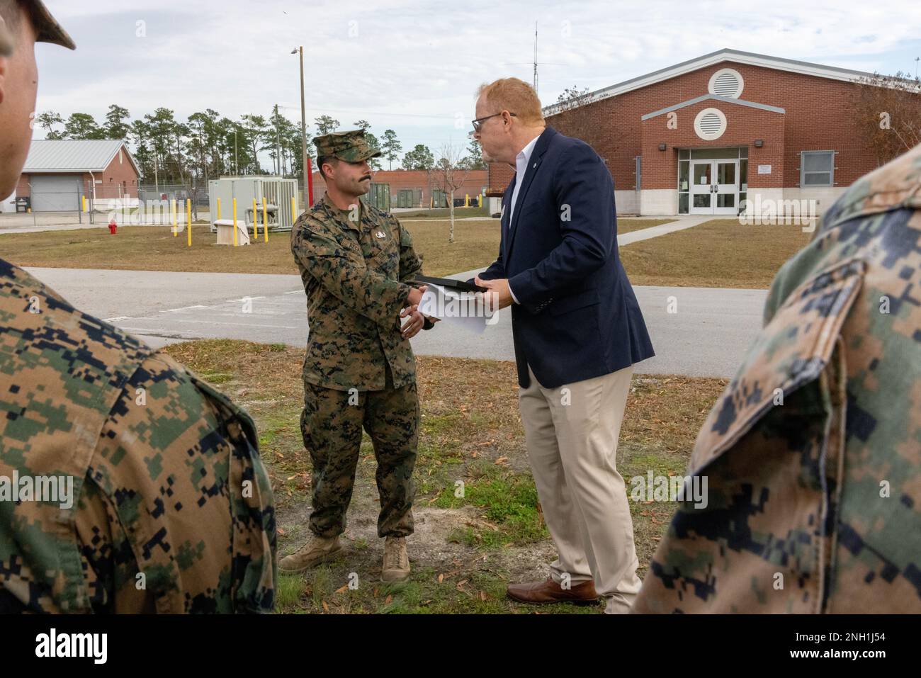 U.S. Marine Corps Sgt. Patricio Recalde Jr., left, an explosive ...