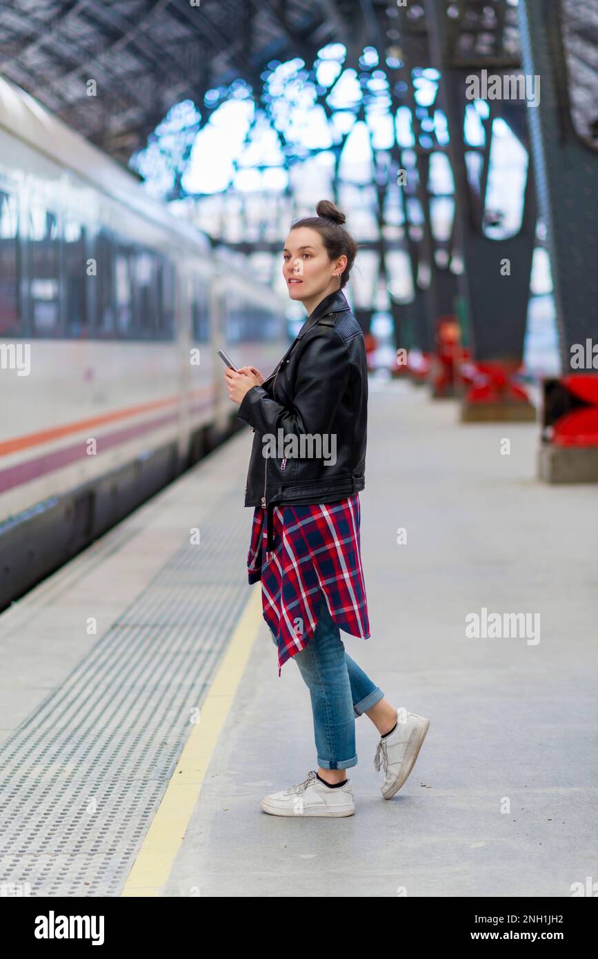 Female tourist on subway hi-res stock photography and images - Alamy