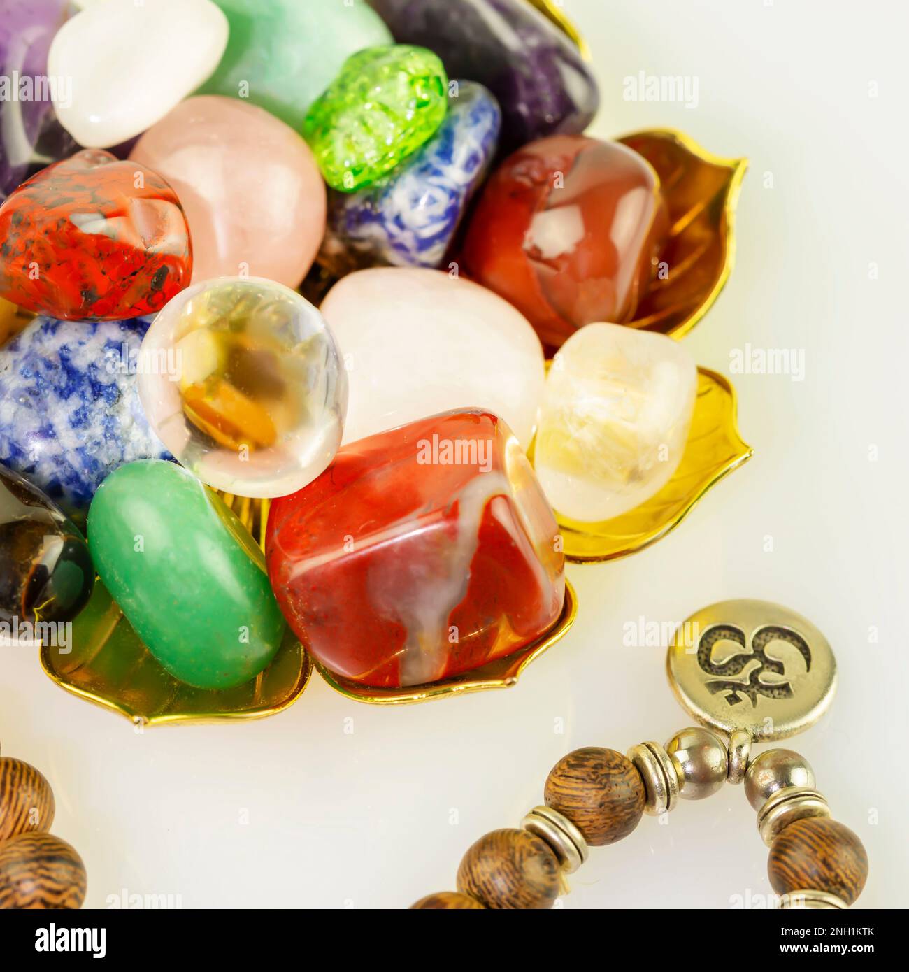 Crystals gemstones set with rosary beads on white background. Minerals ...