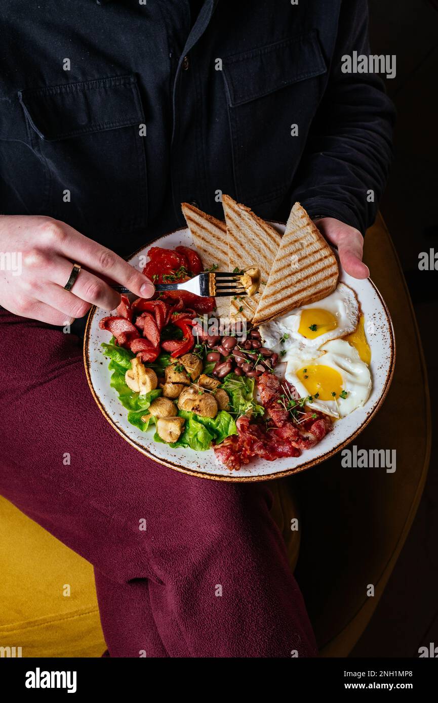 Man traditional english breakfast hi-res stock photography and images ...