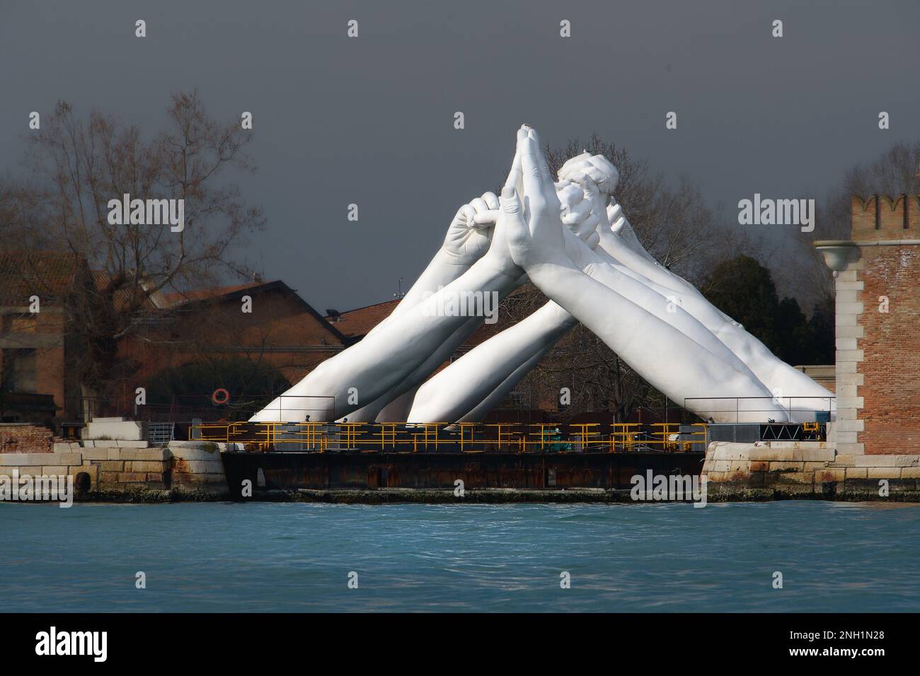 The hands of Italian artist Lorenzo Quinn, representing a symbol of ...