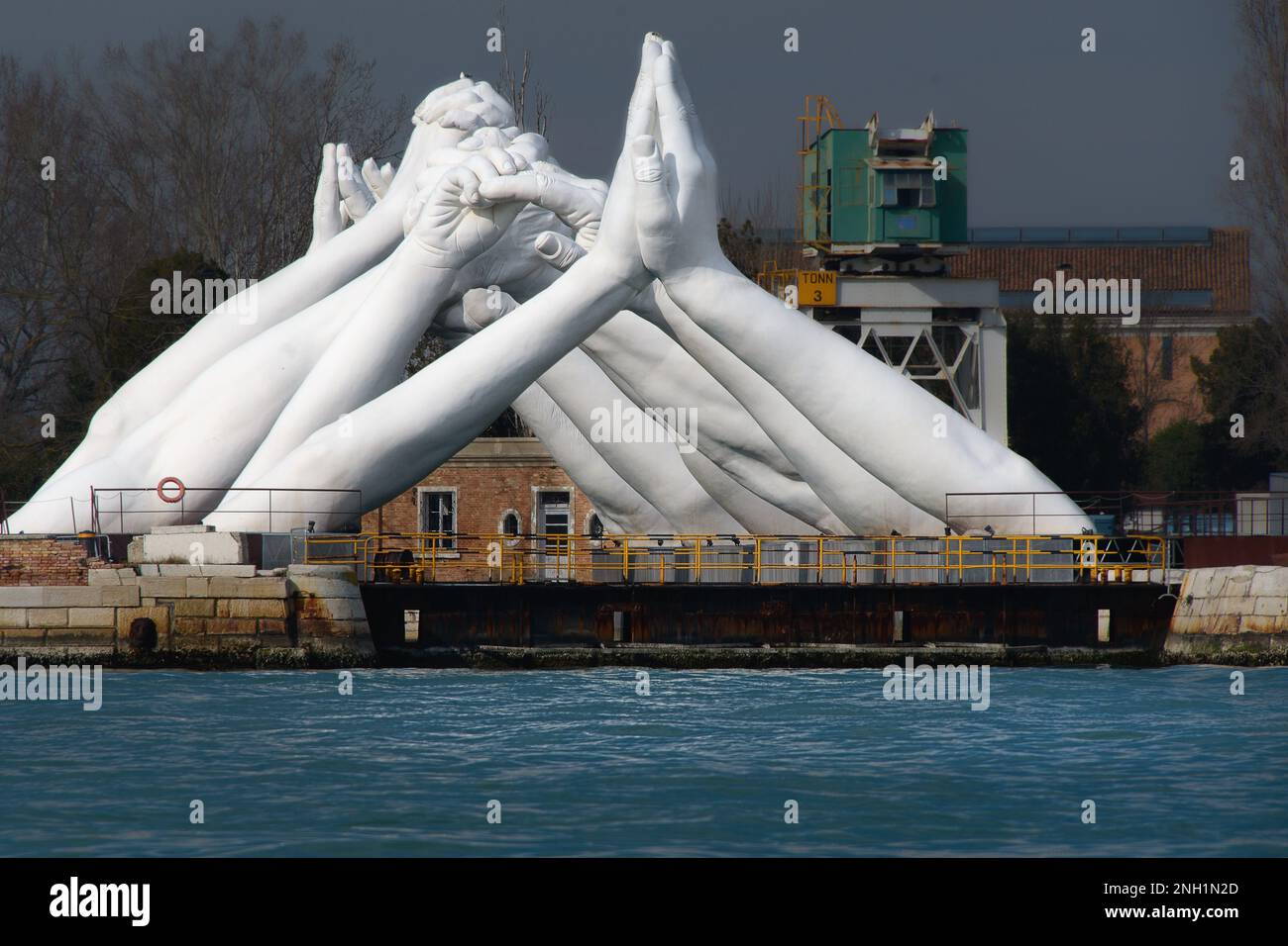 The hands of Italian artist Lorenzo Quinn, representing a symbol of ...