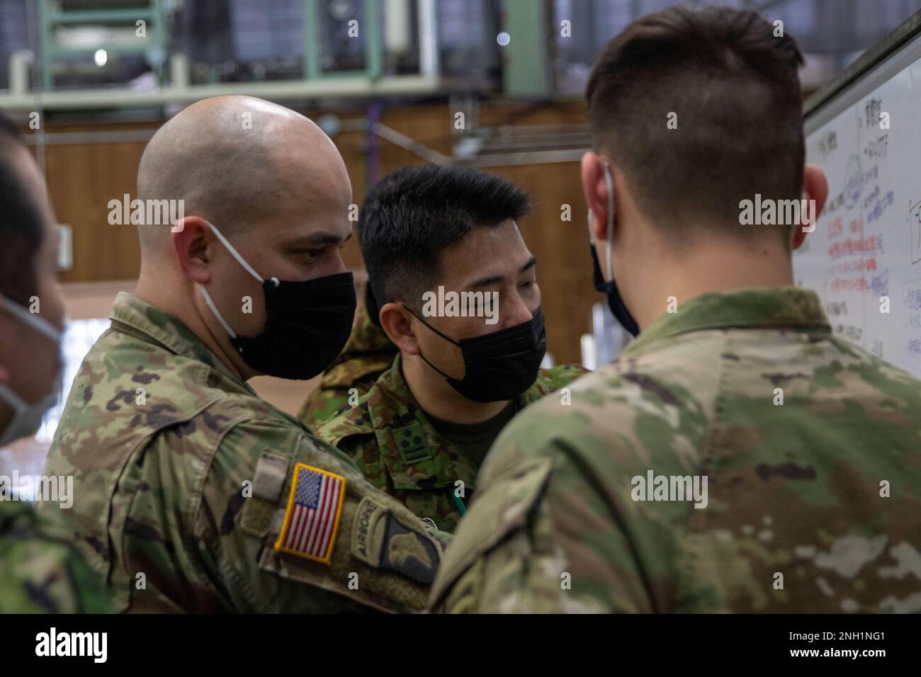 Soldiers assigned to 1st Brigade 11th Airborne Division work together ...