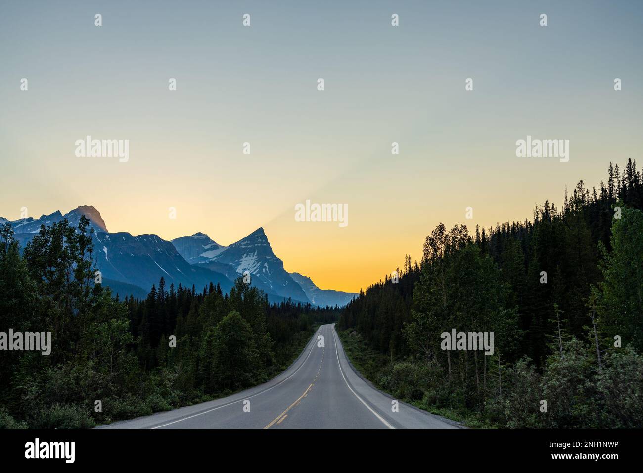 Driving on Icefields Parkway at twilight time. Alberta Highway 93 ...