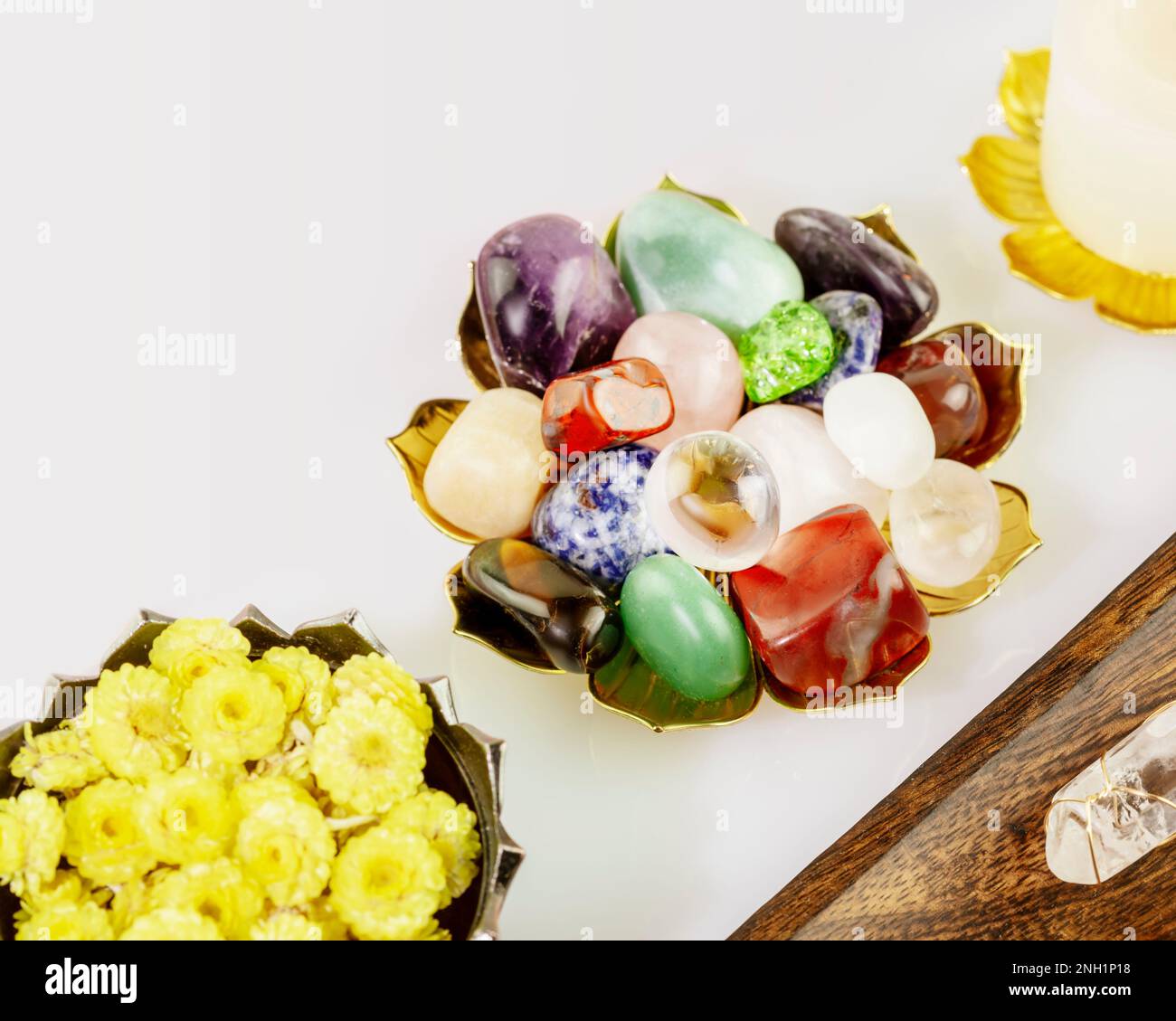 Healing ritual with crystals gemstones set, candle and dry flowers on ...