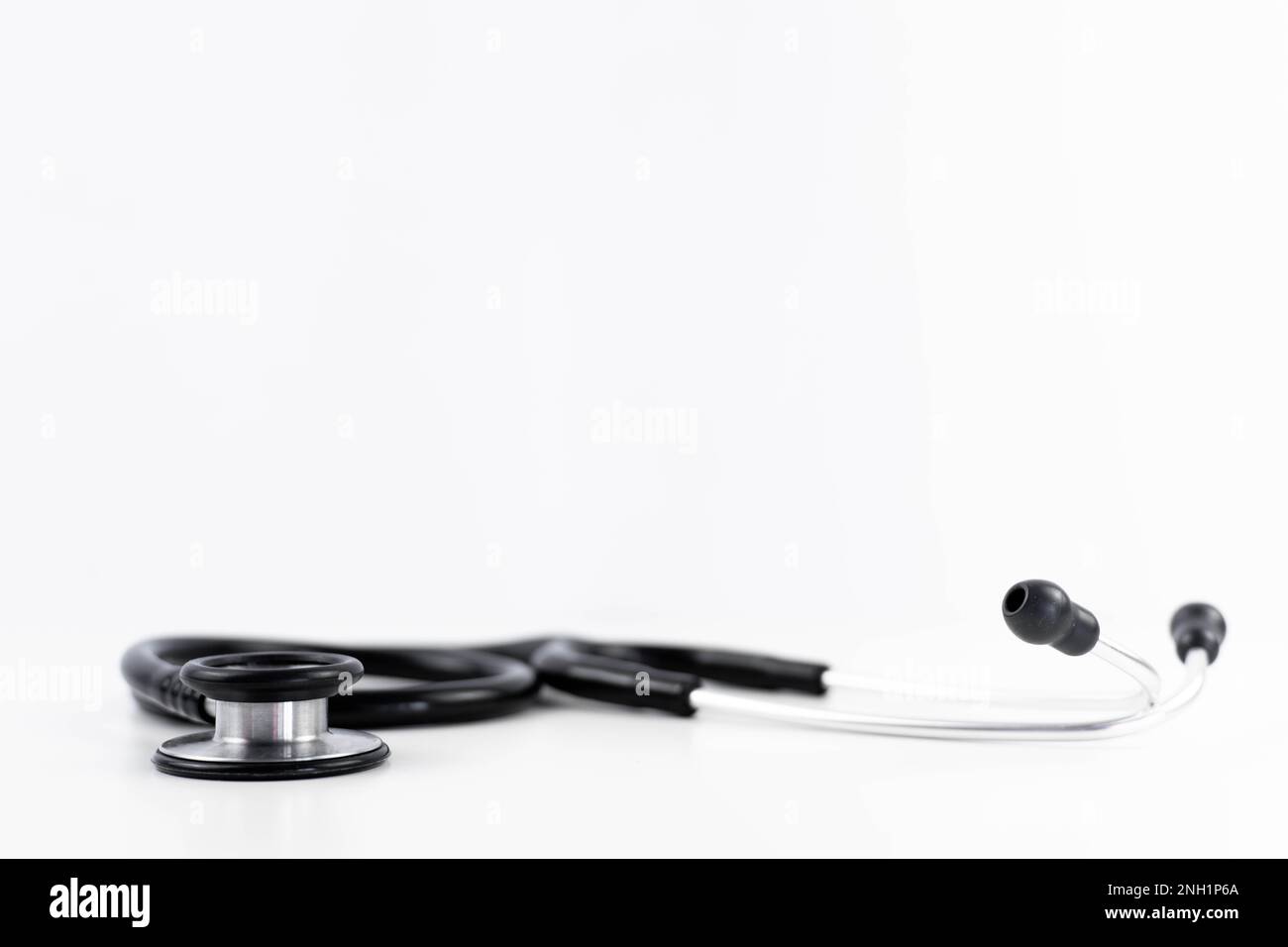 Side view of a medical stethoscope on white background with horizontal ...