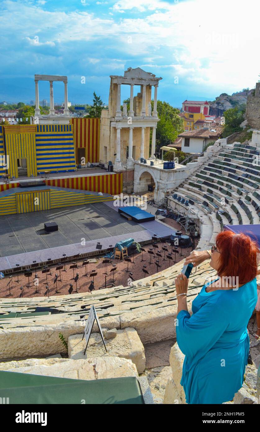 Senior woman enjoying the view of Plovdiv city from the Ancient Roman ...