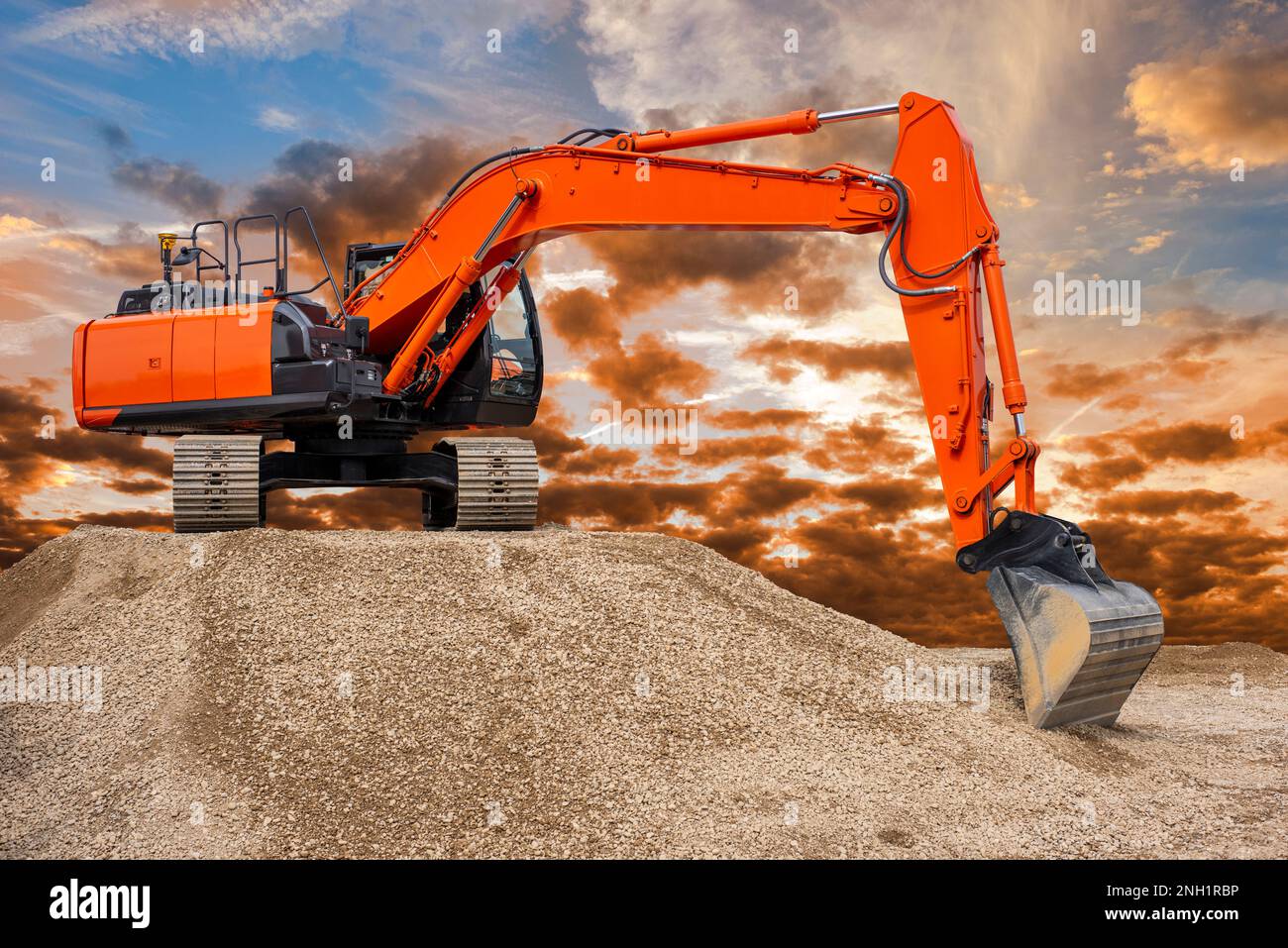 excavator is working and digging at construction site Stock Photo - Alamy