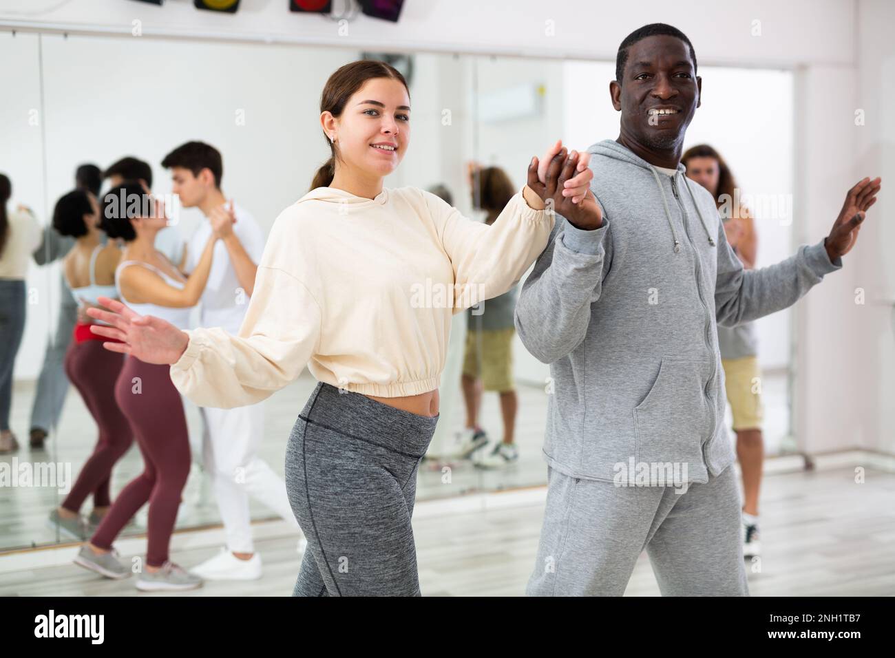 Cheerful people girl guy dancing hi-res stock photography and images ...