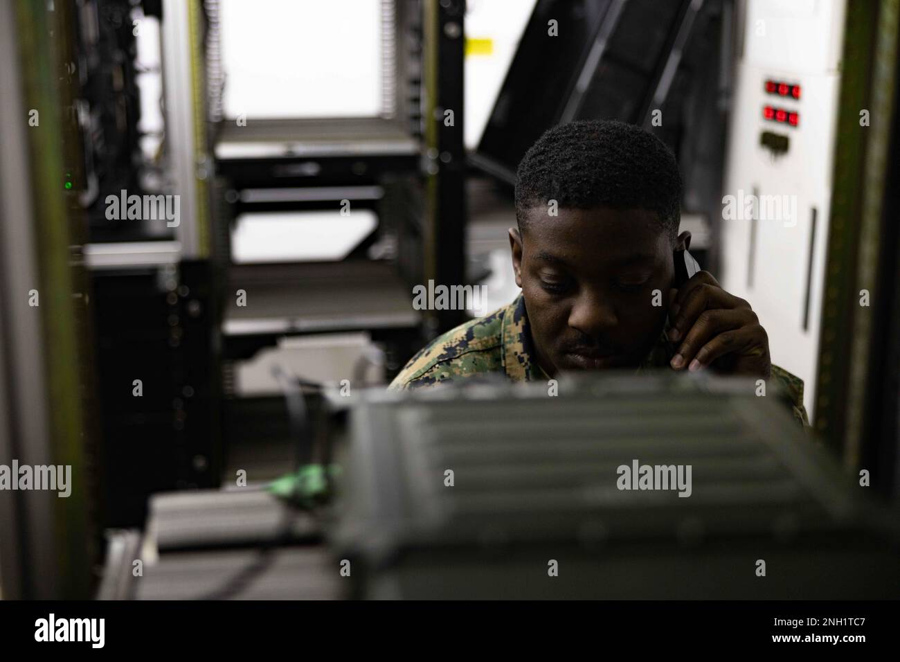 U.S. Marine Corps Cpl. Jamal McBride, a ground electronics transmission ...