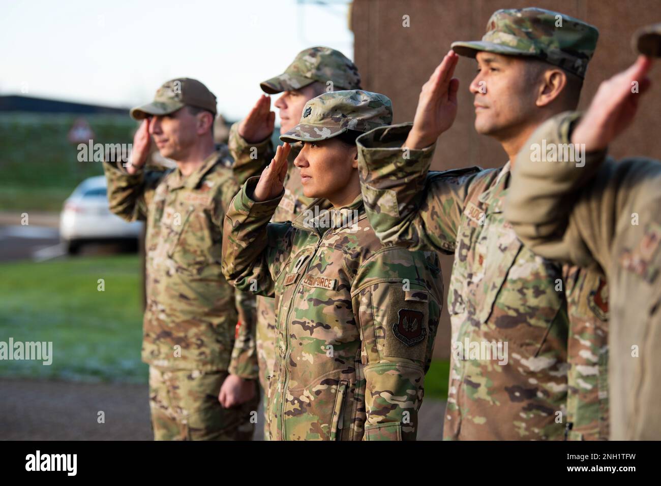 Leaders from the 501st Combat Support Wing salute U.S. Air Force Maj ...