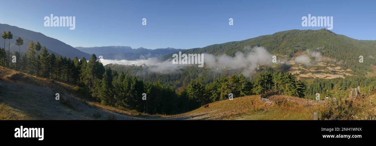 Autumn rural mountain landscape panorama with forest and low clouds ...