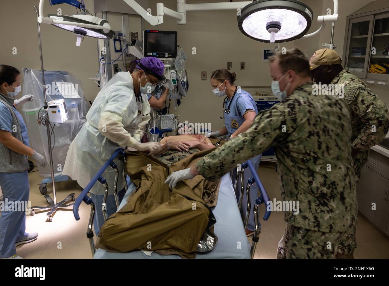 U.S. Navy medical personnel with Naval Hospital Camp Pendleton evaluate ...