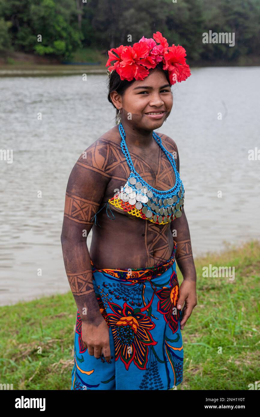 An indigenous Embera woman dressed up for visitors in her village on Lake Alejuela in Panama ...