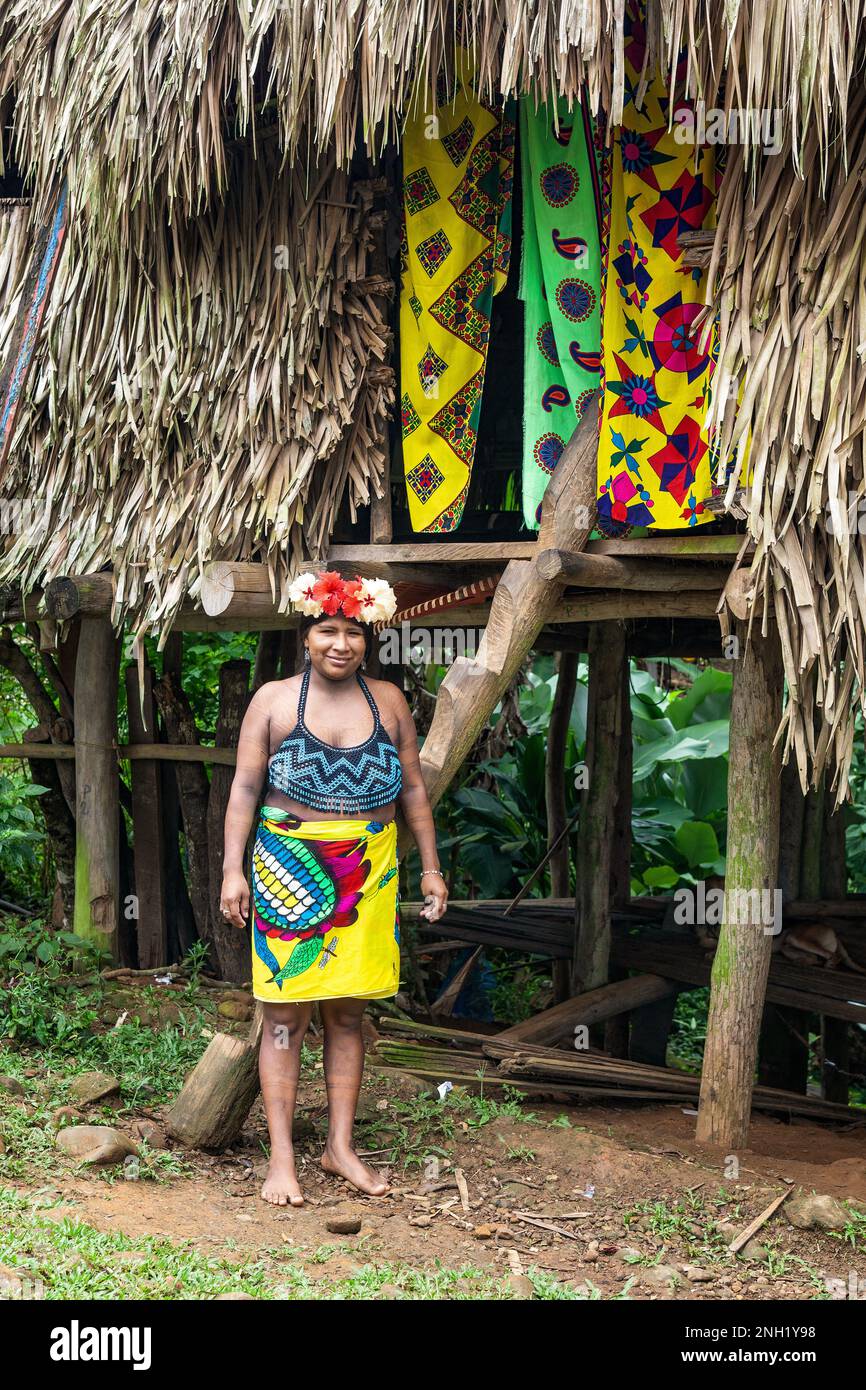 An Embera women in front of her hut. The indigenous Embera live in ...