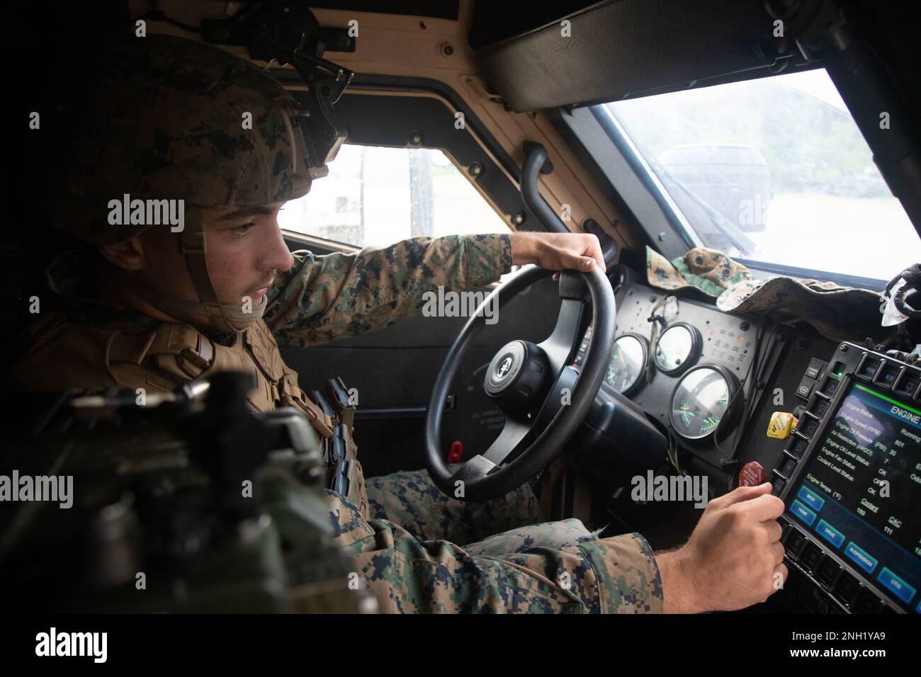U.S. Marine Corps Pfc. Nick Farrar, motor transport operator, 3d Marine ...