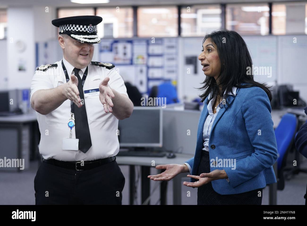 Home Secretary Suella Braverman (right) during a visit to Warrington ...