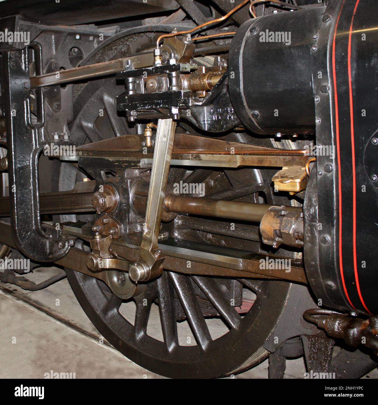 A Large Wheel on a Powerful Steam Locomotive Stock Photo - Alamy