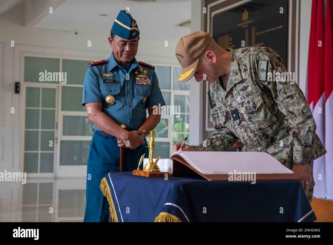 Indonesian Navy Rear Adm. Denih Hendrata oversees U.S. Navy Rear Adm ...