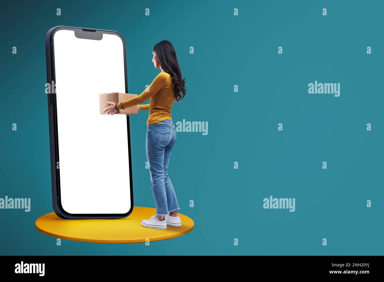 Woman receiving a box from her smartphone, online express delivery ...