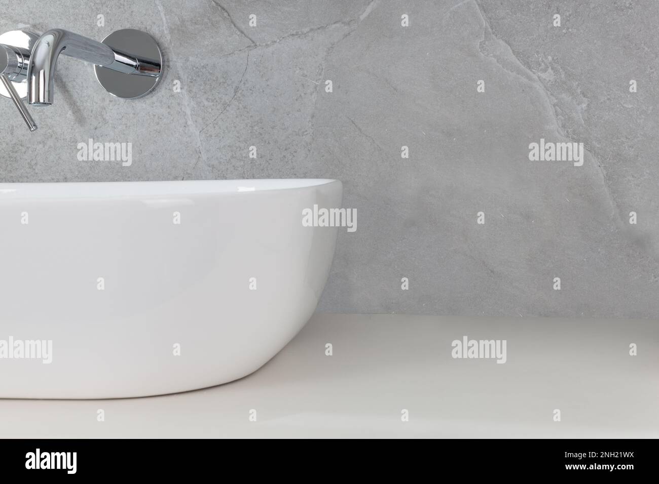 Modern, white basin and countertop with space for product presentation ...