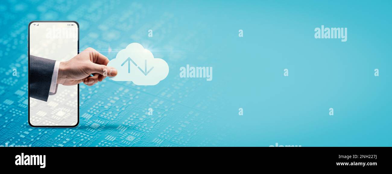 Smartphone and businessman holding a cloud with arrows, cloud computing and data storage concept ...