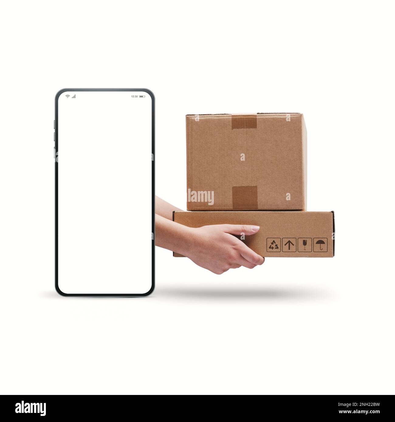 Hands holding cardboard boxes and smartphone with blank screen, express ...