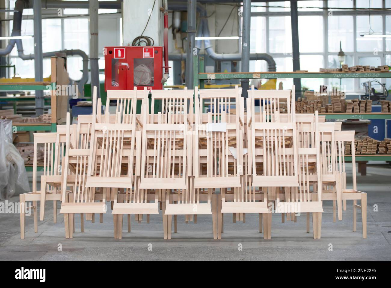 Furniture production from a natural tree. Production of chairs at the ...