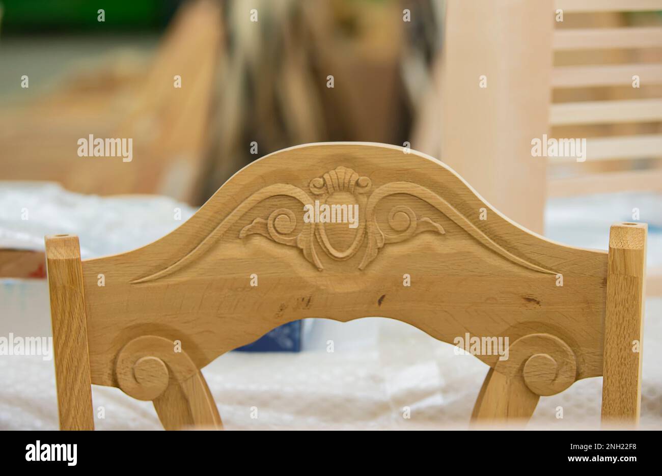 Furniture production from a natural tree. Production of chairs at the ...