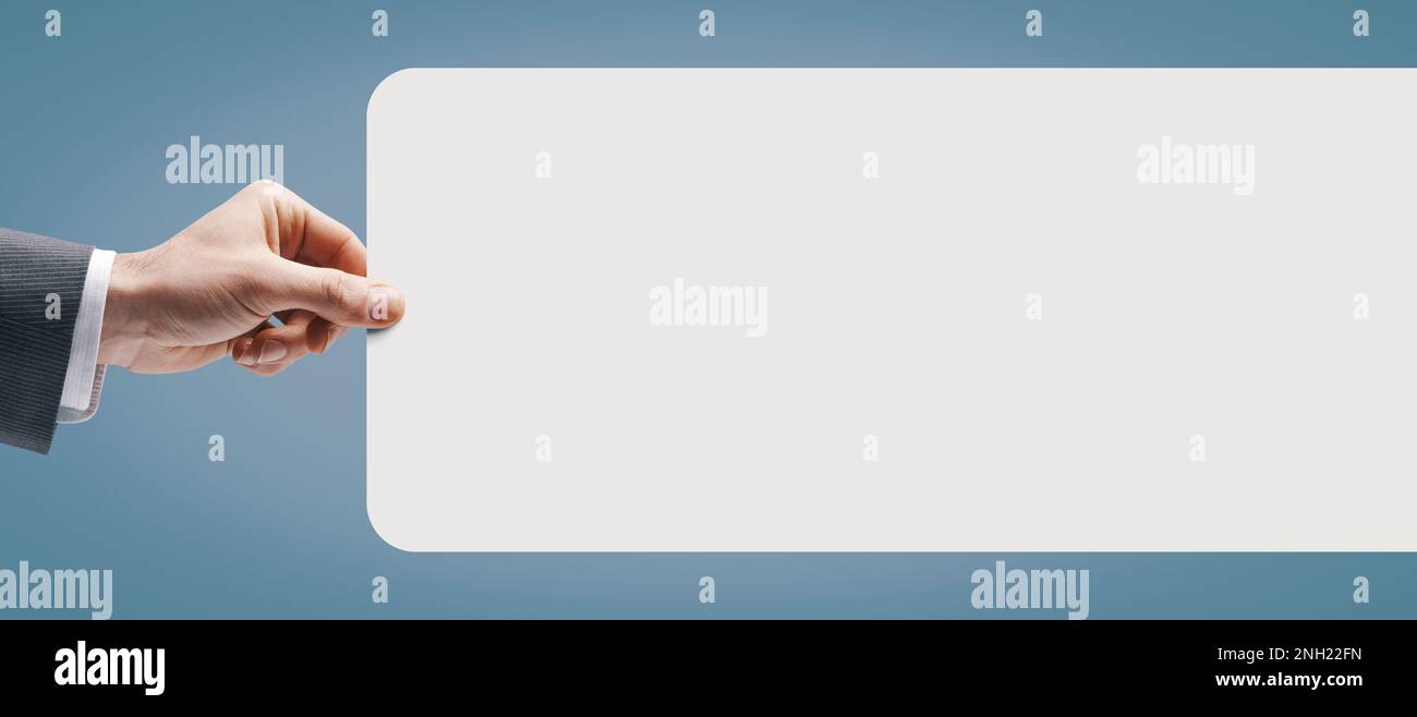 Corporate businessman hand holding a blank sign, business and ...