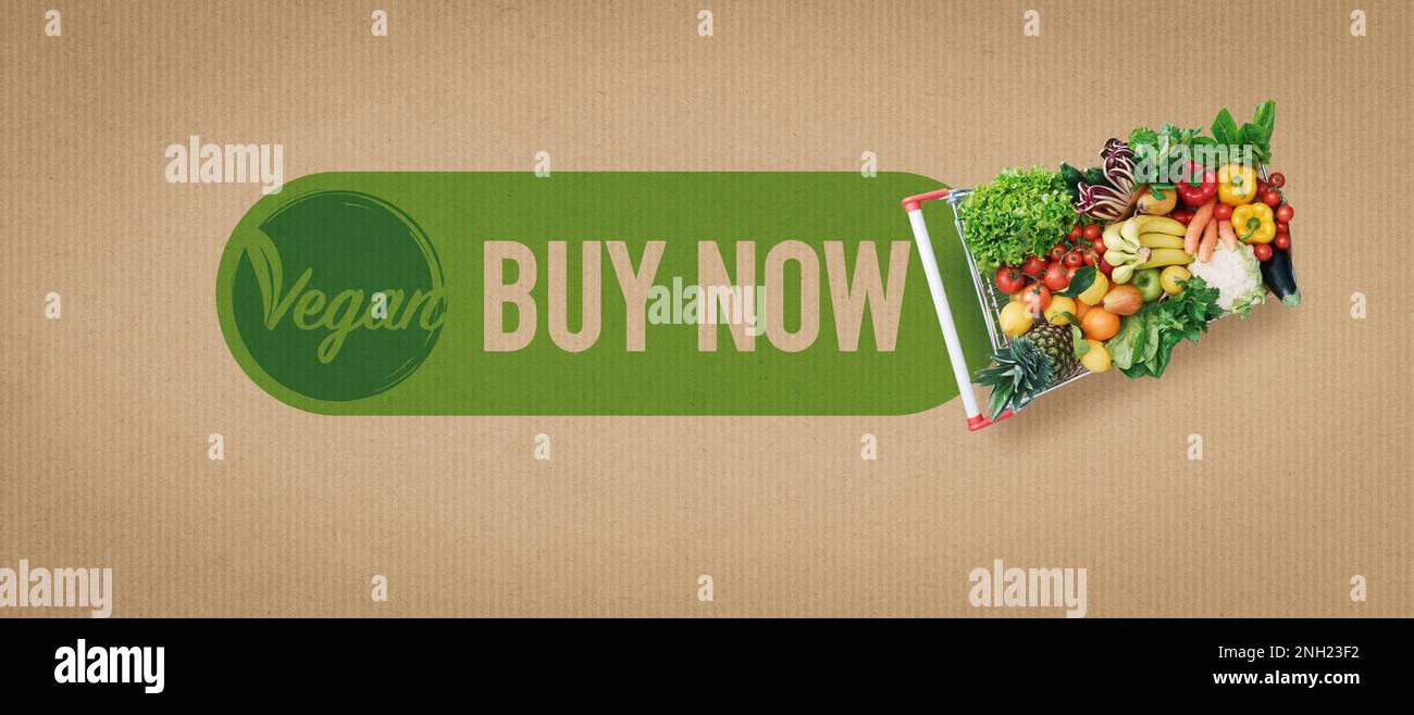 Online grocery shopping and vegan food, shopping cart full of fresh ...