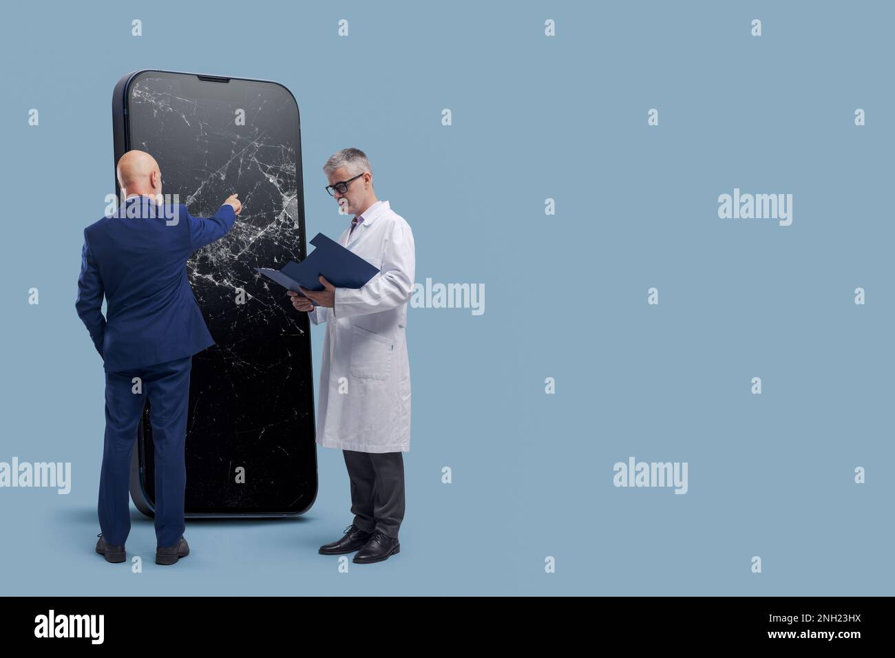 Smartphone and electronics repair service concept: big mobile phone ...