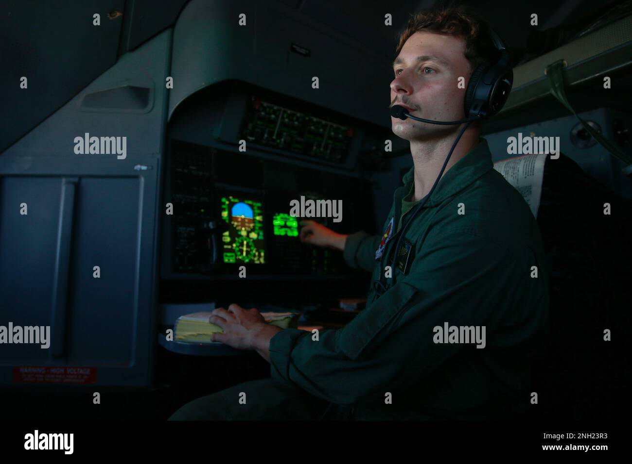 U.S. Marine Corps Sgt. Montana Bingen, a loadmaster with Marine Aerial ...
