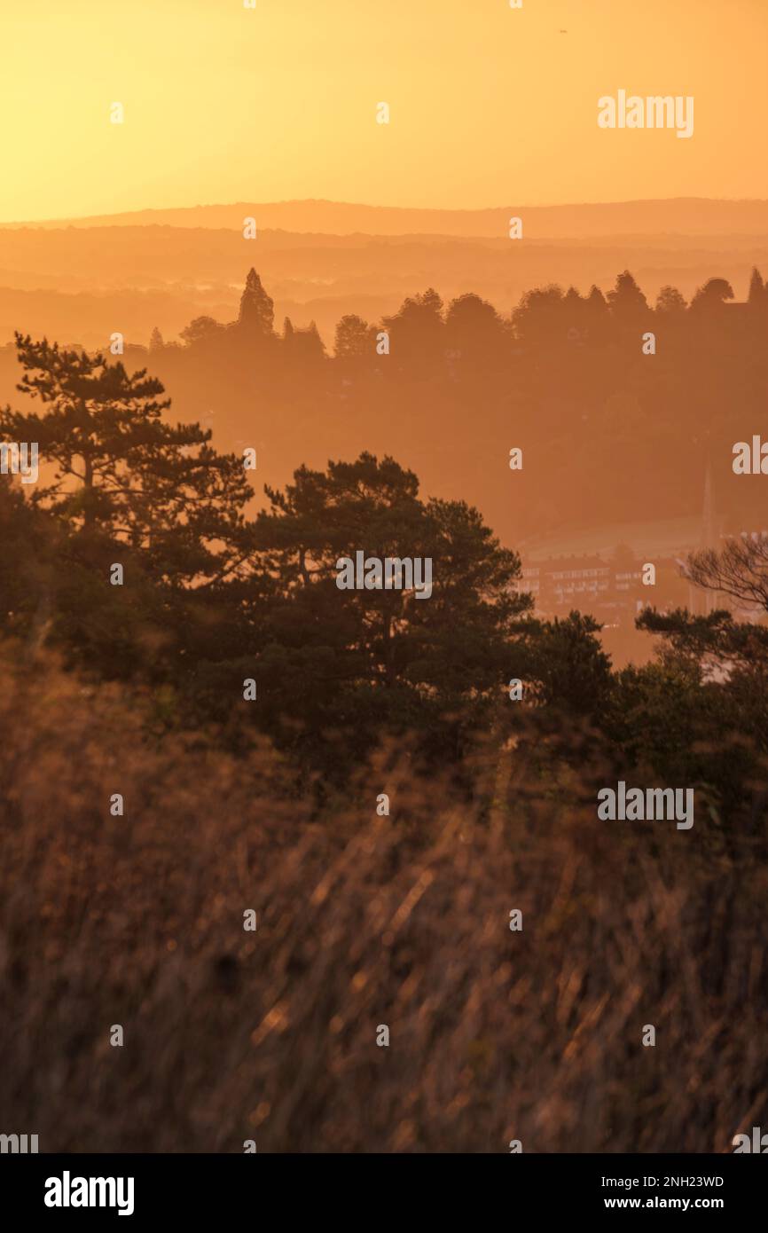 Wide elevated view of the English Town of Dorking at sunrise from the ...
