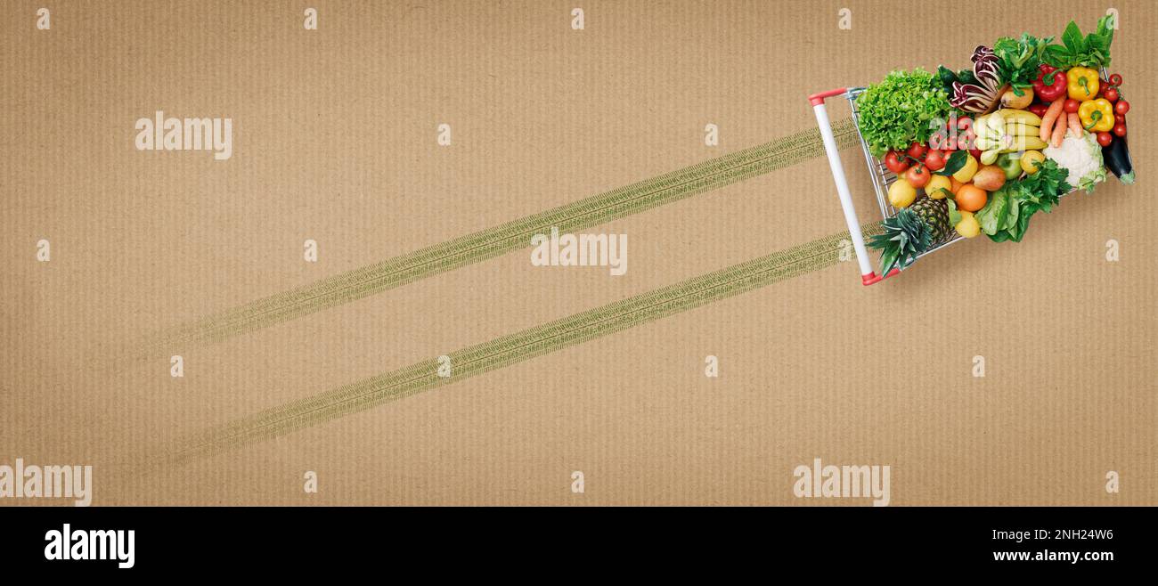 Grocery shopping banner: shopping cart full of vegetables and fruits ...