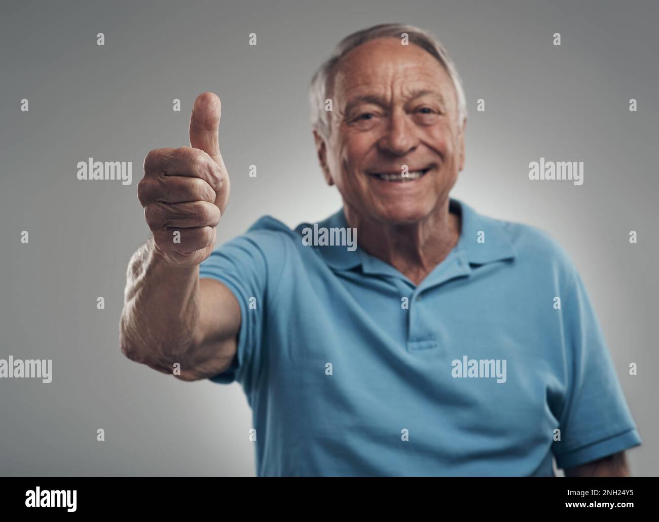 Id do this day all over again happily. a happy elderly man giving the ...